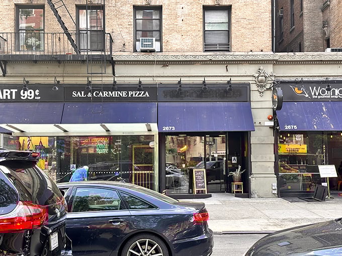 Sal & Carmine's understated blue awning is like that quiet person at parties who turns out to be the most interesting.