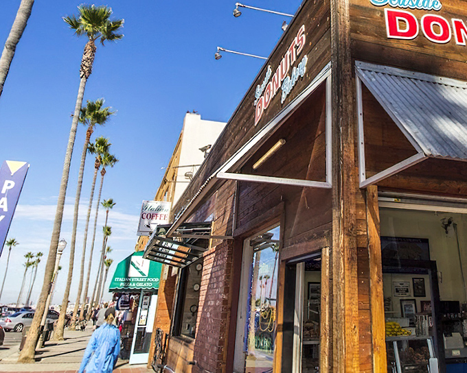Weathered wood and ocean breezes frame this beachside donut haven. Surfside's treats taste better with salt air.
