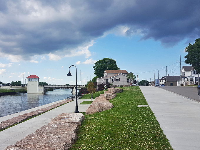 Two Rivers' waterfront buildings stand like sentinels against the sky, where Lake Michigan's waters meet small-town charm.