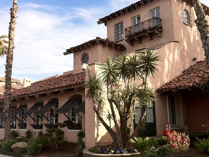 The elegant fountain and pink walls promise a dining experience far removed from the typical interstate pit stop.