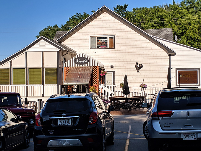 The simple wooden planter beneath Kurt's sign is like the steakhouse itself – unpretentious, solid, and perfectly suited to its purpose.