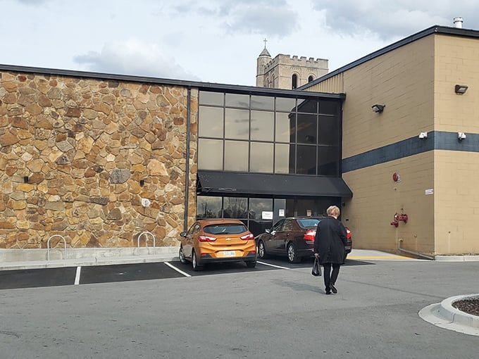 Behind this modest stone exterior lies a volunteer-powered wonderland of carefully curated secondhand treasures.