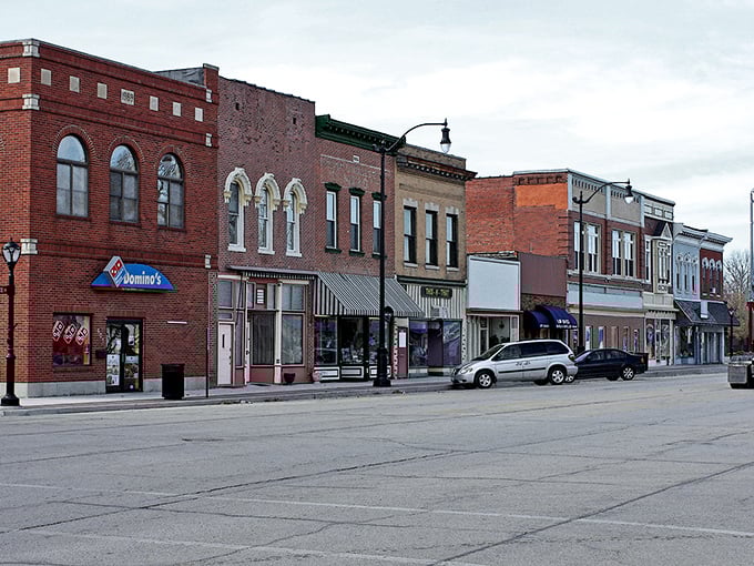 Sunset bathes Litchfield's main street in golden light, highlighting a place where retirement doesn't require a gold mine.