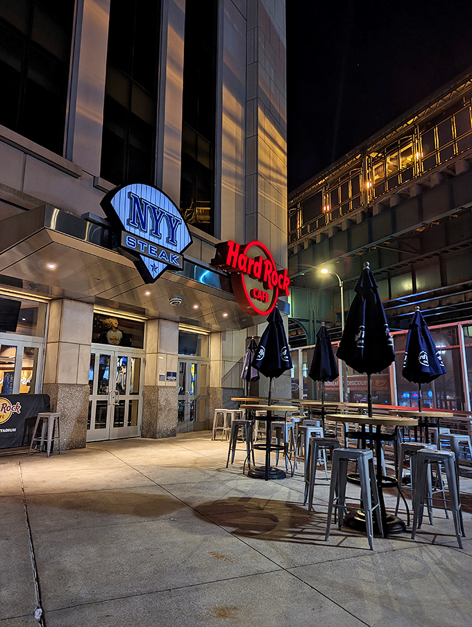 As night falls, NYY Steak lights up like the scoreboard after a Yankees homer. Dinner and a game, anyone?