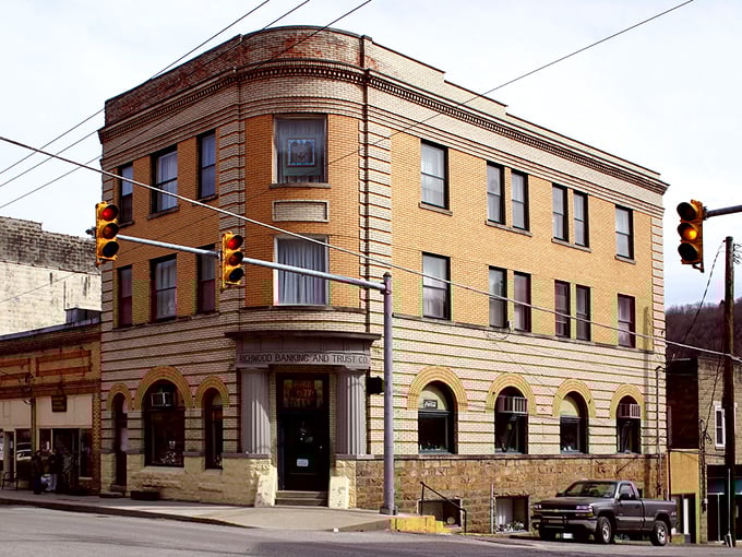 That corner bank building has probably heard more town secrets than a therapist, standing watch over generations of Richwood residents.