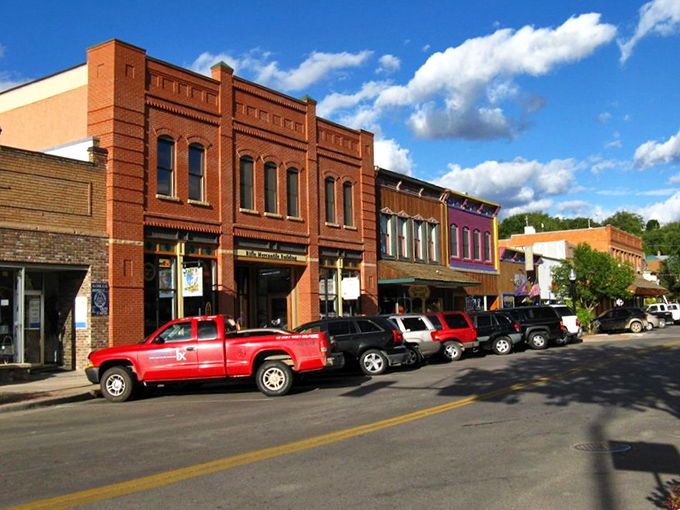 Rifle's vintage movie house promises entertainment without big-city prices. That neon sign has guided moviegoers to silver screen escapes for generations.