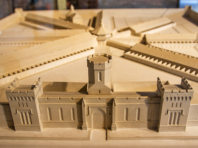 This detailed architectural model shows the prison's revolutionary radial design. Like a wagon wheel of incarceration, with guards at the hub.