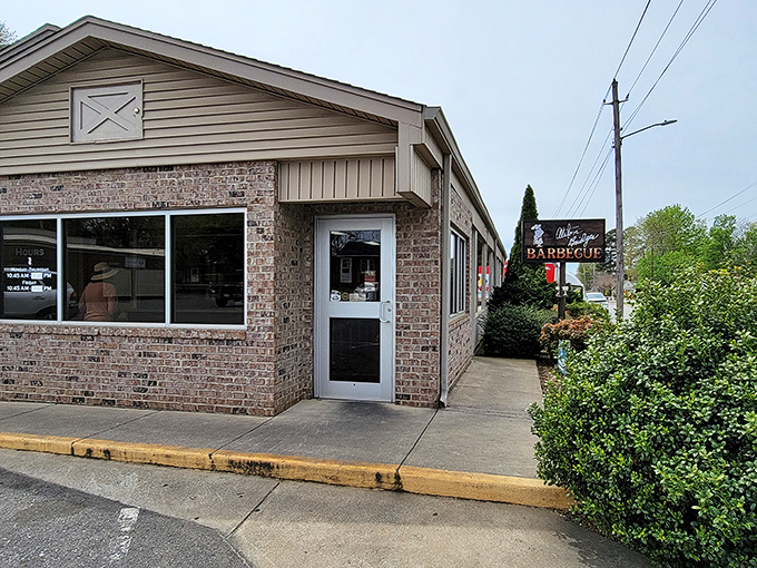 Alston Bridges Barbecue's unassuming exterior hides smoky treasures within&mdash;proof that in North Carolina, the humblest buildings often house the greatest flavors.