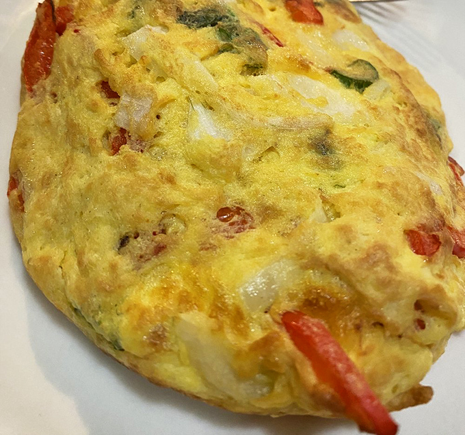 This vegetable-packed omelet is so perfectly puffed and golden, it almost makes eating broccoli before noon seem like a reasonable life choice.