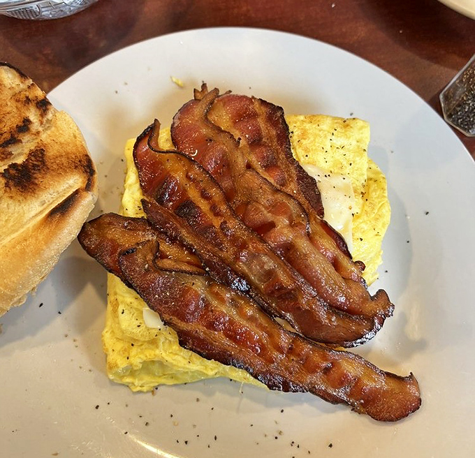 Bacon that's achieved the perfect crisp-to-chew ratio, paired with eggs that would make any chicken proud.