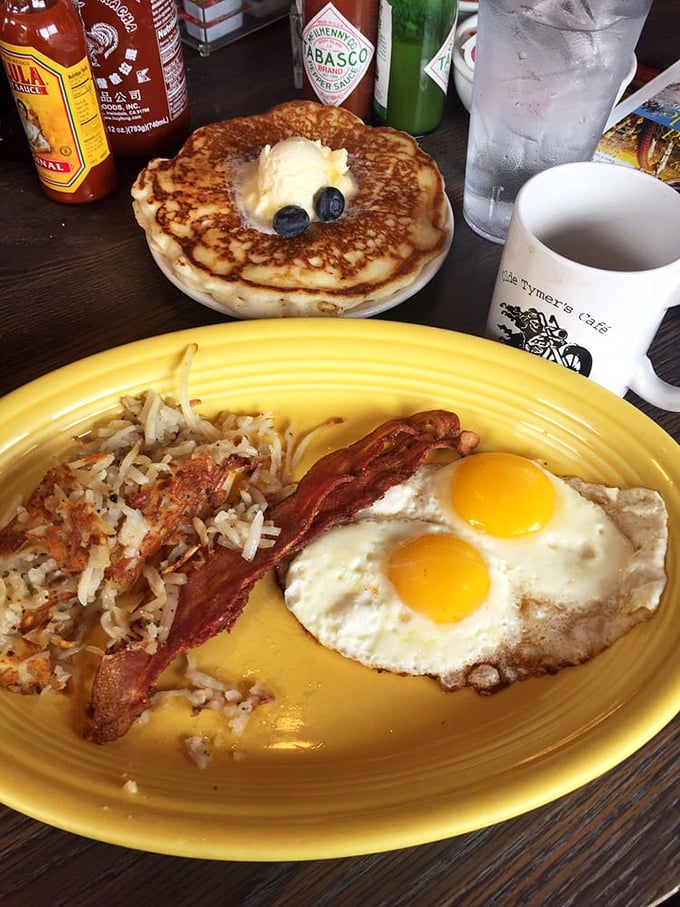 Motorcycle memorabilia and Sturgis rally signs reveal the cafe's connection to road culture&mdash;a pit stop that became a destination.