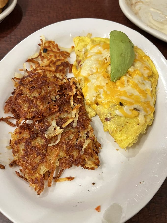 Breakfast architecture at its finest: an omelet that's been to college, graduated with honors, and now drives a nicer car than you do.