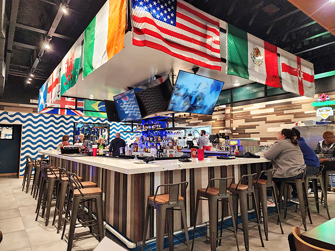 The bar is a United Nations of flags, where beverages from across the pond await your diplomatic relations.