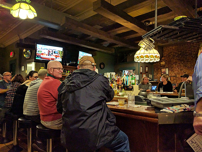The bar where strangers become friends and friends become family. That Tiffany-style lamp has witnessed more Columbus history than most textbooks.