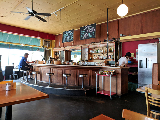 The bar &ndash; where coffee transforms into courage in the morning, and craft beers soothe the day's battle scars by evening.