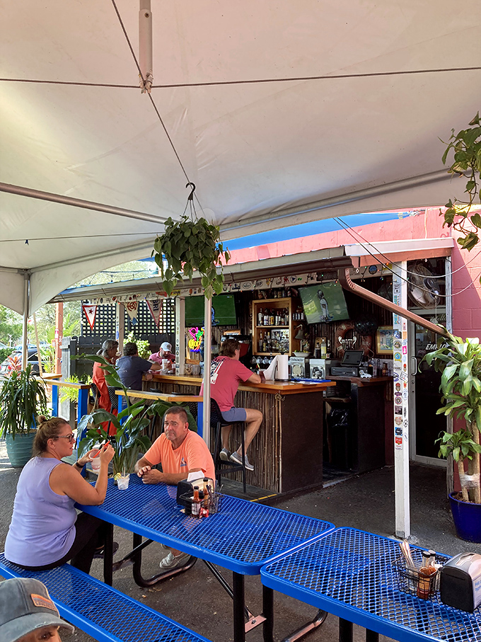 The outdoor bar area&mdash;where island breezes meet barbecue smoke in a vacation-worthy marriage of atmosphere and flavor.