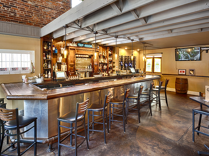 The tap room: where history and hops collide in a beautiful marriage of exposed brick, gleaming wood, and the promise of perfectly poured pints.