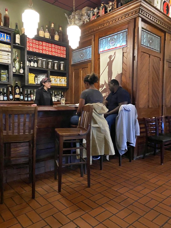 The bar area feels like it's been serving perfect Chianti since before Prohibition, with wood details that tell their own stories.
