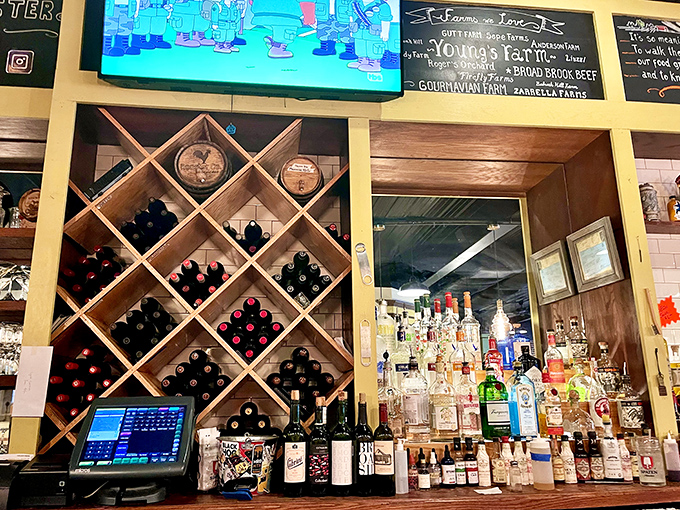 The bar's wooden wine rack isn't just storage&mdash;it's a promise of good times ahead. Decisions, decisions.