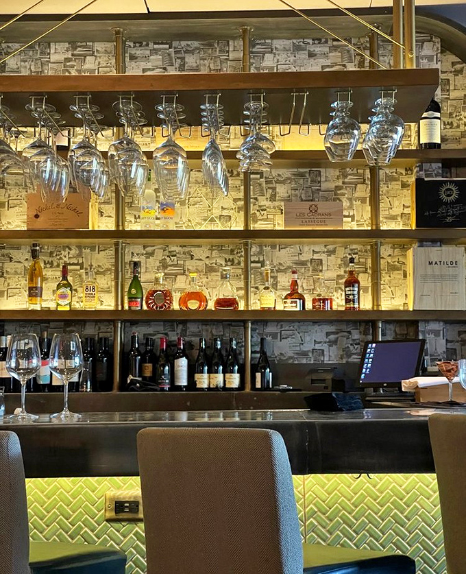 The bar doesn't just serve drinks&mdash;it showcases them like the liquid jewelry they are. Those illuminated bottles are basically a beacon for sophistication.