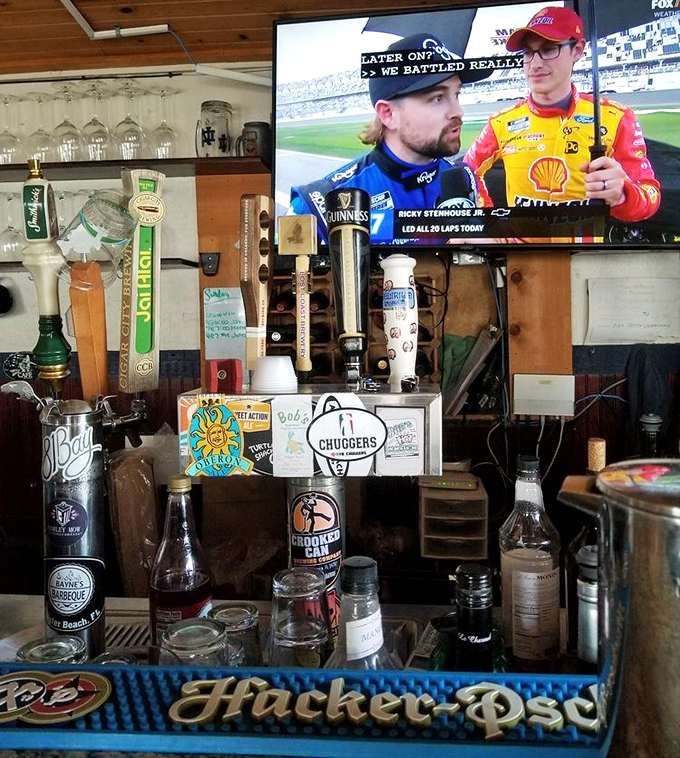 A bar stocked with liquid happiness and a TV for those who can't miss the game. Vacation multitasking at its finest.