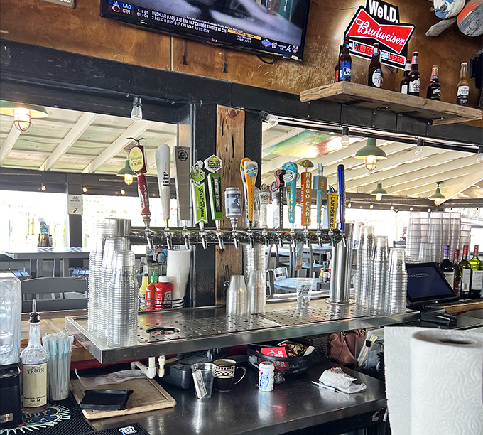 Liquid happiness on tap. The well-stocked bar promises cold comfort after a day of Florida heat, with local brews standing ready to quench any thirst.