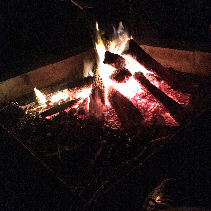 Primal satisfaction: a beach campfire that makes even the most sophisticated traveler revert to childlike wonder and s'more cravings.