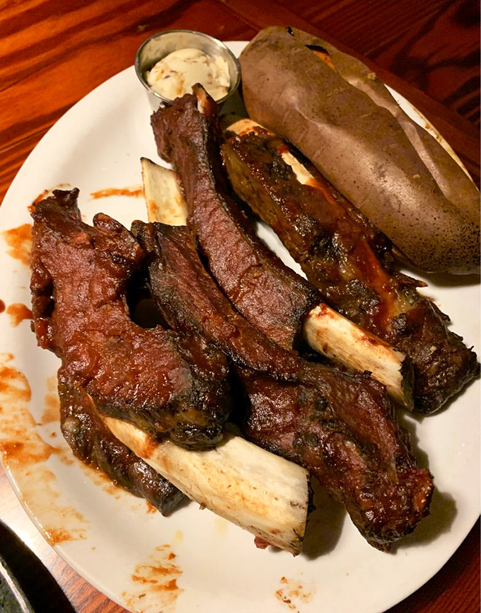 Beef ribs that make you want to howl at the moon. Fred Flintstone would weep tears of joy at the sight of these prehistoric-sized beauties.