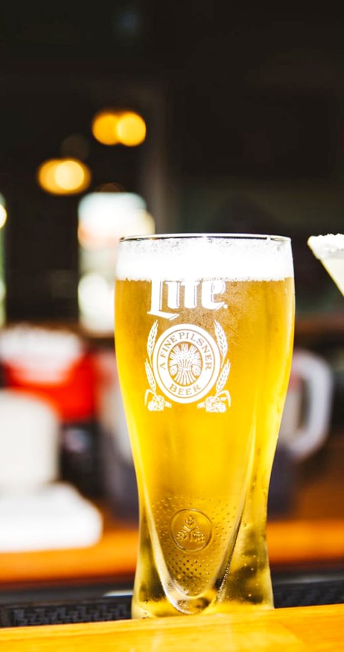 A perfectly poured pilsner catching the light just right. This golden elixir is what Midas would drink if he got thirsty.