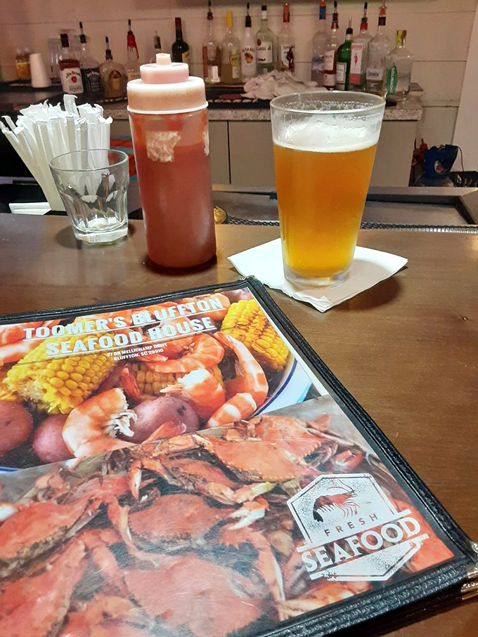 Cold beer and a menu promising seafood delights—some partnerships are simply meant to be. The anticipation is half the fun.
