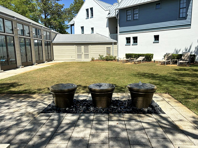 A perfectly manicured green space surrounded by architecture that makes you question why you've been living in a regular house all this time.