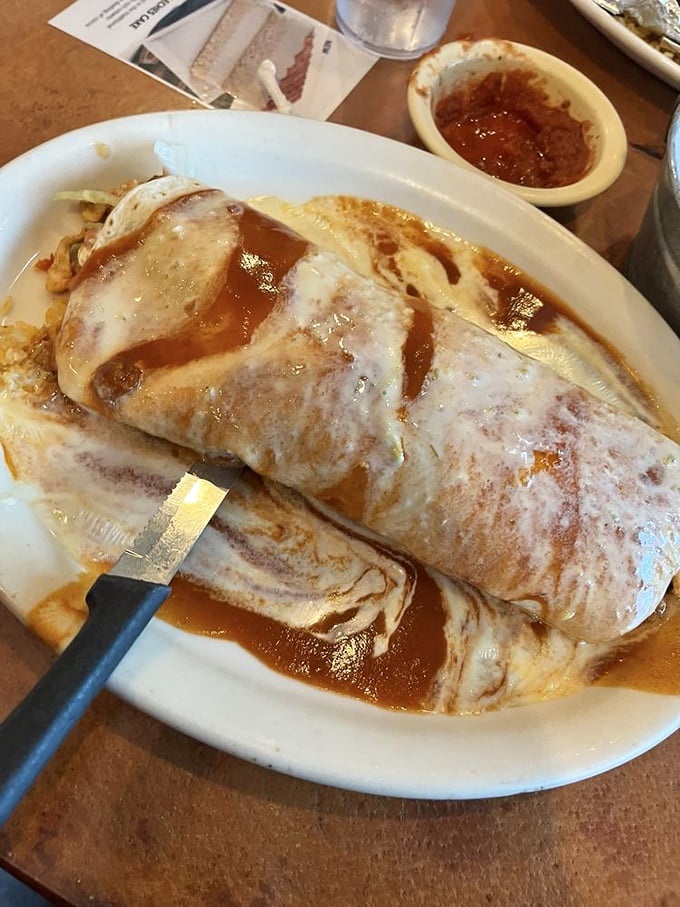 This burrito isn't just large&mdash;it's life-affirming. Wrapped in a flour tortilla and drenched in sauce that makes you want to high-five the chef.
