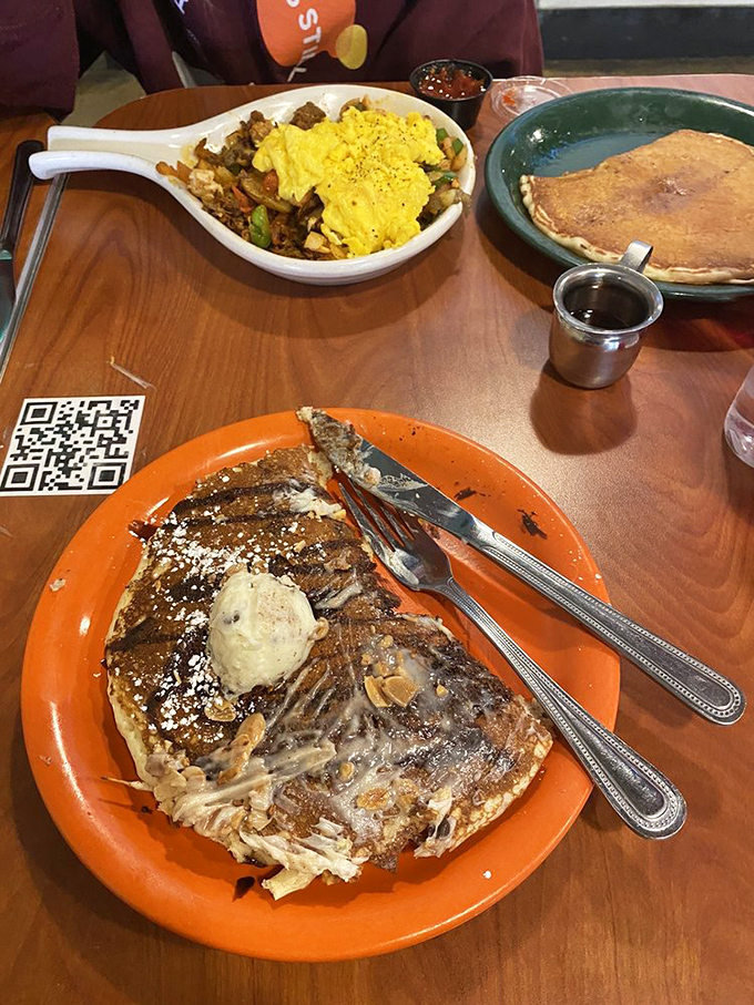 A table spread that tells the story of breakfast ambition—pancakes, eggs, and enough deliciousness to fuel an entire day of Columbus adventures.