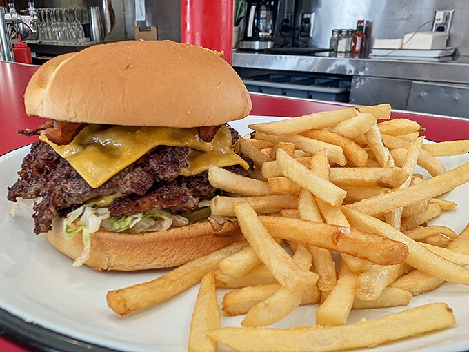 The dynamic duo of diner delight. This burger and fries combo is the Batman and Robin of lunch&mdash;a partnership that always saves the day.