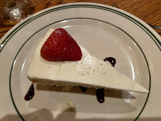 A slice of cheesecake so pristine and perfect, it looks like it's posing for its driver's license photo&mdash;if driver's licenses captured pure deliciousness.