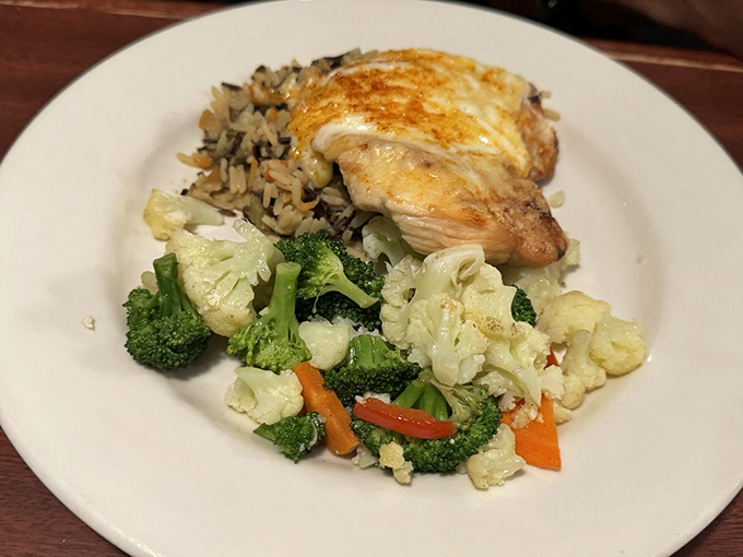 Perfectly seared chicken breast with garden-fresh vegetables. A dish that makes you feel virtuous while still delivering on flavor.