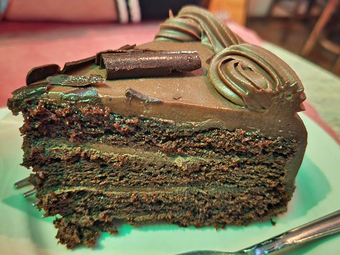 Chocolate cake so rich it should have its own tax bracket. The kind of dessert that makes you consider skipping the main course next time.