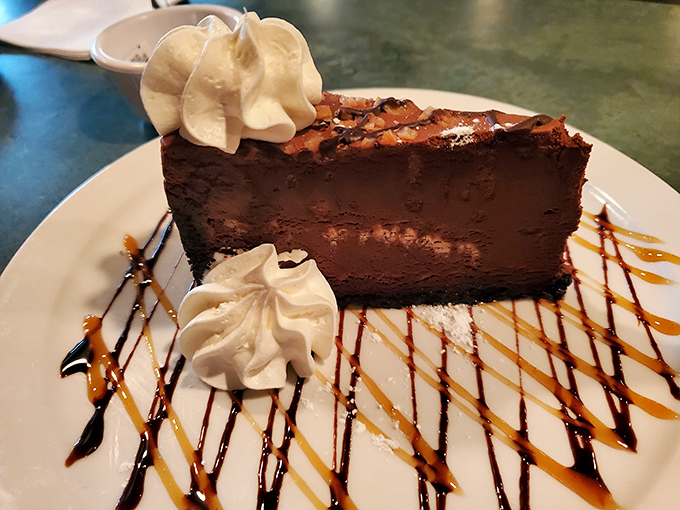 A chocolate dessert so decadent it should come with its own pardon form. Those whipped cream dollops aren't garnish&mdash;they're essential supporting characters.