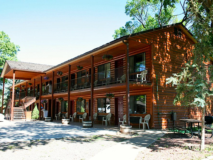 The Chuck Wagon Lodge offers rustic comfort with a side of nostalgia. Those porch chairs practically whisper, "Sit a spell and watch the sunset."