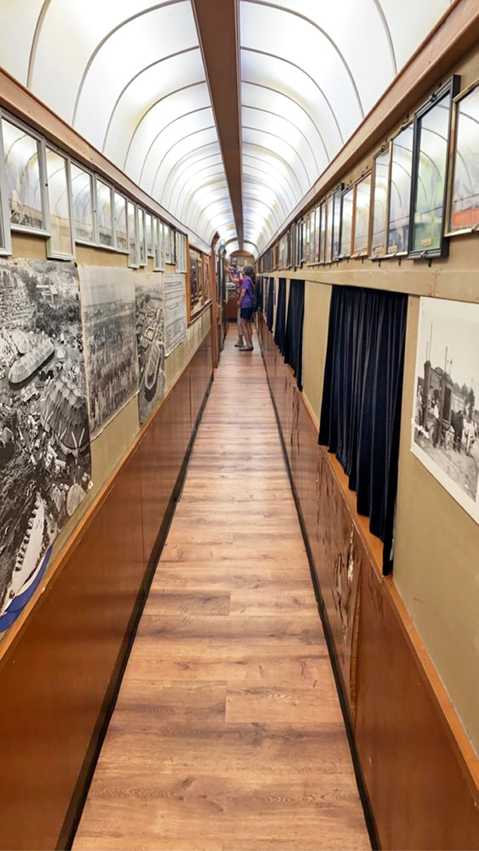 Step into a museum-worthy corridor where history lines both sides, creating an immersive journey through America's railroad and circus heritage.