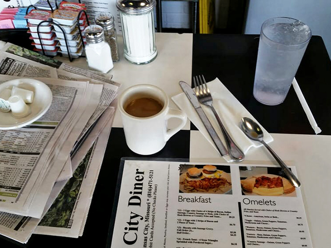 The classic diner setup: coffee, newspaper, and the promise of a good meal. Some traditions don't need updating.