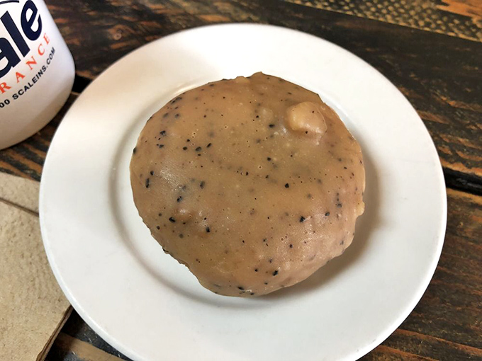 This coffee-studded donut sits like a planet of possibility &ndash; those little specks are flavor meteors waiting to hit your taste buds.