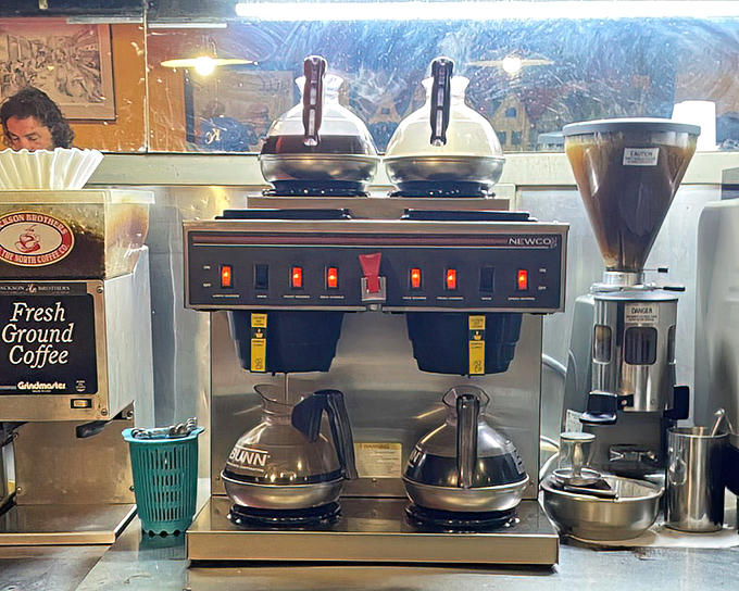 The coffee station&mdash;where liquid motivation is brewed with military precision and boundless generosity.