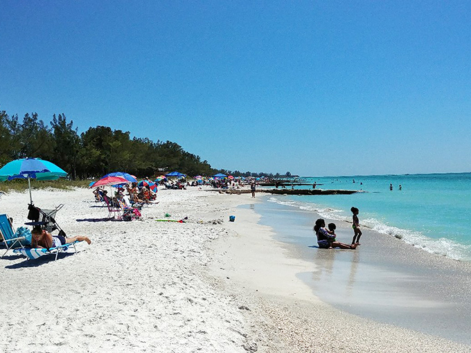 Beach day perfection. Coquina Beach offers that classic Florida scene where azure waters meet sugar-white sand under an impossibly blue sky.
