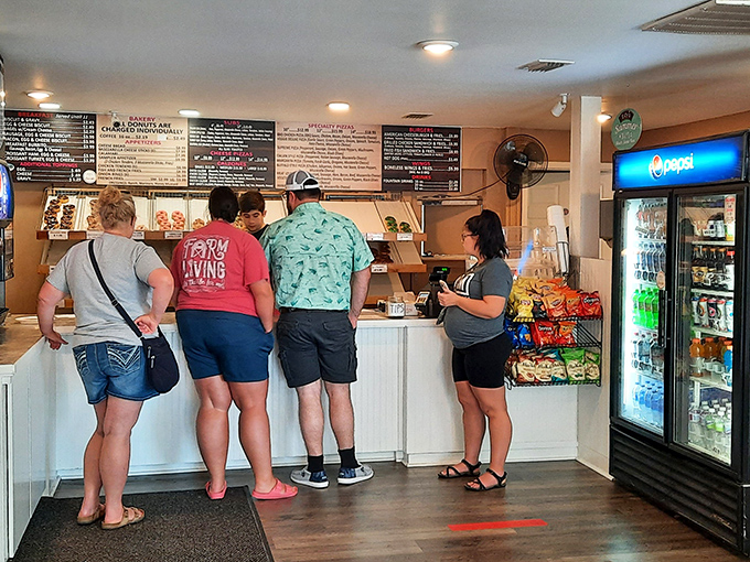 The counter where dreams are ordered, calories are ignored, and life-changing food decisions are made daily.