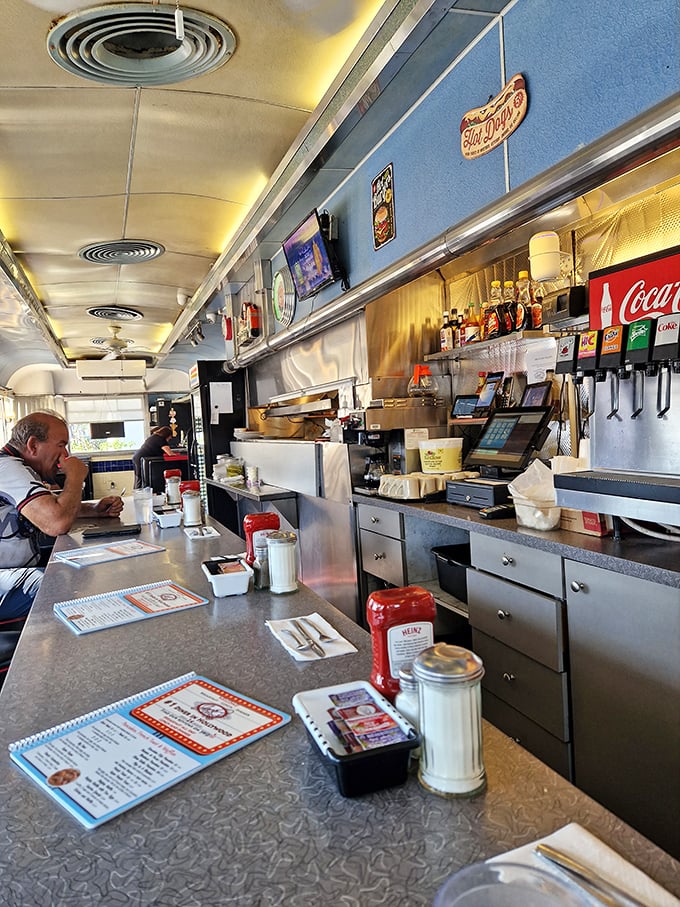 The beating heart of diner magic &ndash; a counter where coffee flows freely, orders fly to the kitchen, and friendly banter is always on the menu.