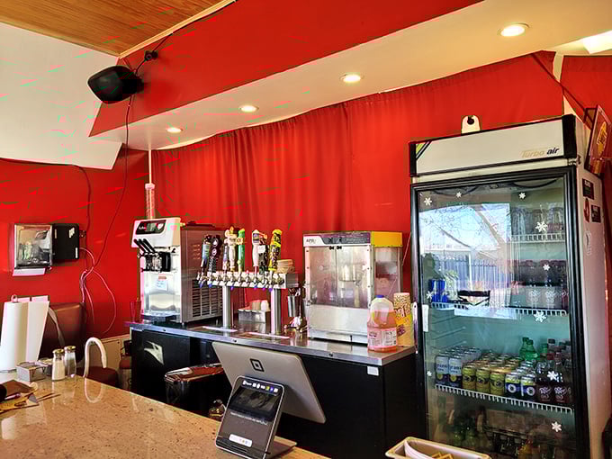 Where magic happens behind the scenes. The vibrant red backdrop hints at the bold flavors coming your way.