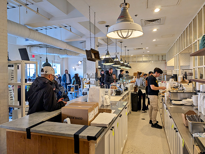 The bustling counter where pastry dreams come true. Like Willy Wonka's factory, but with fewer Oompa Loompas and more croissants.