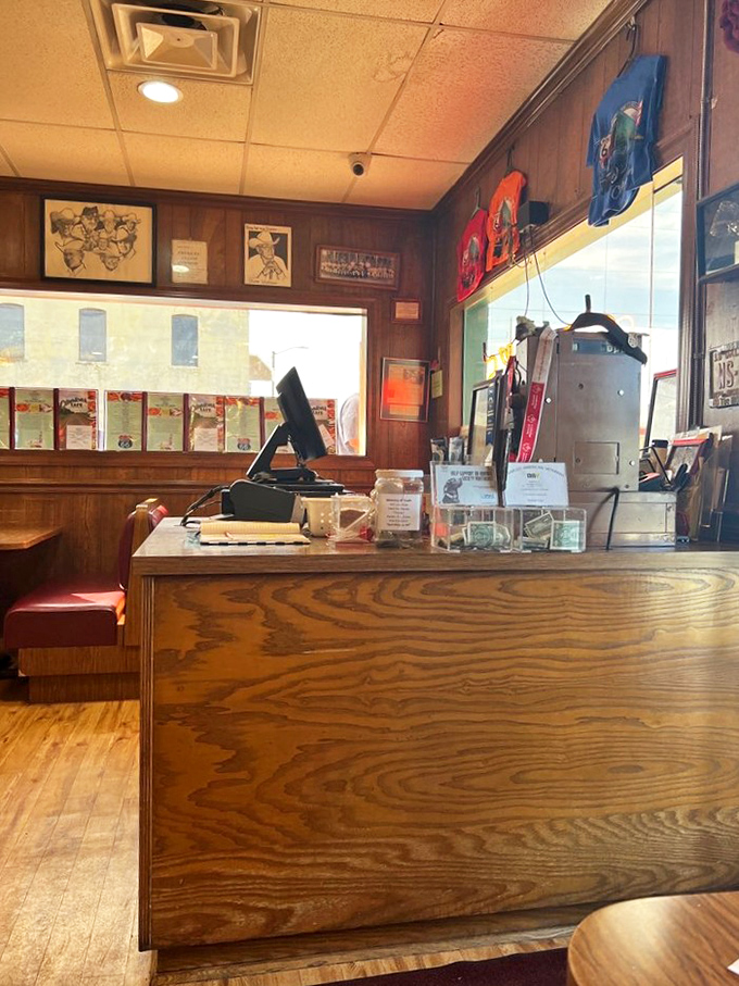 The counter tells stories without saying a word, a command center where orders are taken and Oklahoma hospitality is dispatched with efficiency.
