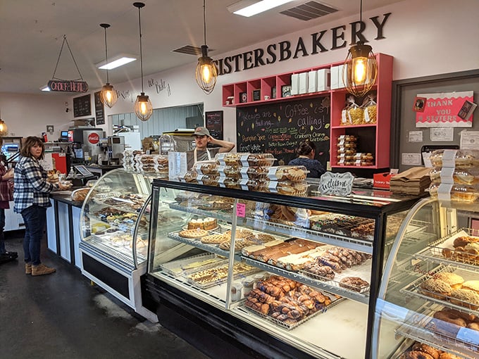 The bakery counter reveals treasures that would make pirates abandon gold for glazed. Each tray holds potential for the perfect sugar rush.